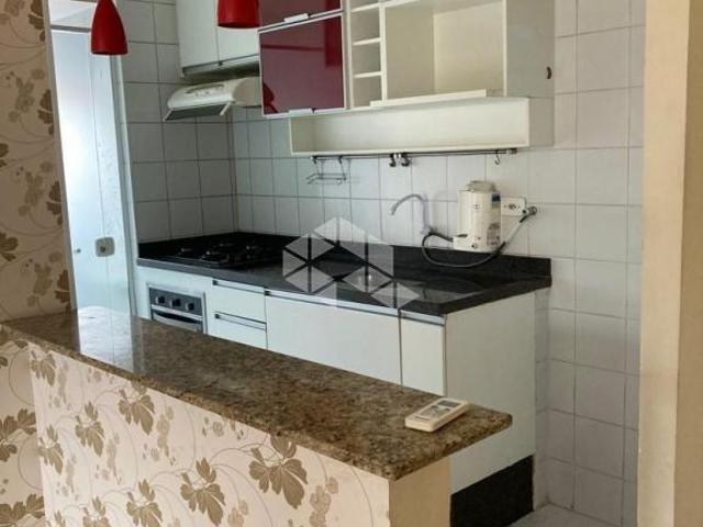 Apartamento à venda, 2 dormitórios, cozinha americana, vaga de garagem