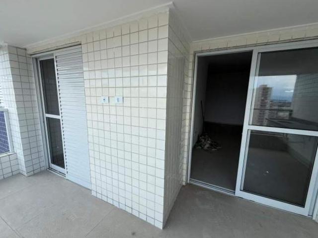Apartamento à venda no Bairro Aviação, Praia Grande SP | 2 quartos 1 suíte | Varanda Gourmet e 2 v