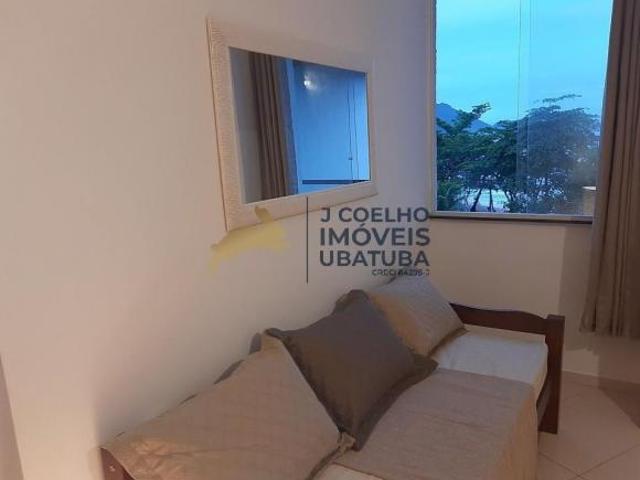 Apartamento Apart/hotel localizado em condomínio pé na areia na Praia das Toninhas em Ubatuba, SP