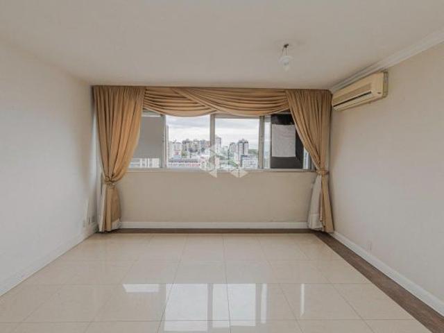 Apartamento Bairro Auxiliadora, 3 dormitórios, 1 suíte, 119m² com vaga de garagem