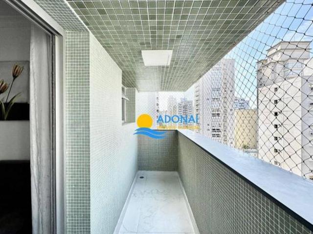 Apartamento beira mar com sacada — Pitangueiras — Guarujá