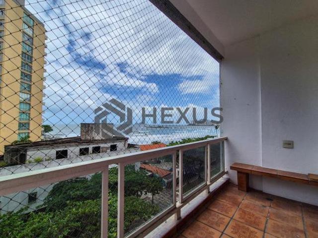 Apartamento beira mar com varanda na Praia das Pitangueiras, Guaruja