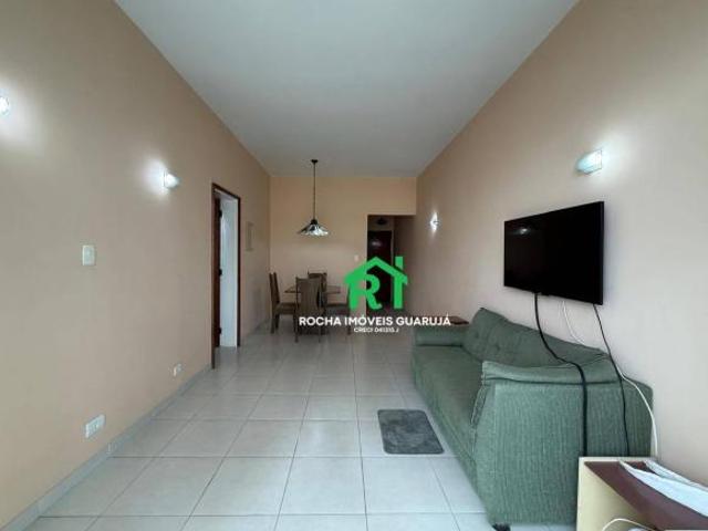 Apartamento beira mar com 2 dormitórios, sacada ampla e 1 vaga na Praia das Pitangueiras – Guarujá