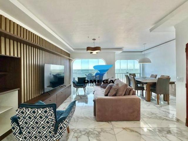 Apartamento beira mar à venda na praia das Pitangueiras no Guarujá I Omega Imoveis