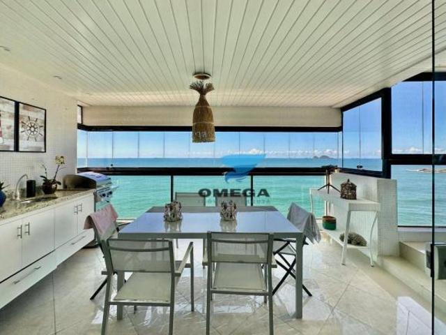 Apartamento beira mar à venda na praia das Pitangueiras no Guarujá I Omega Imoveis