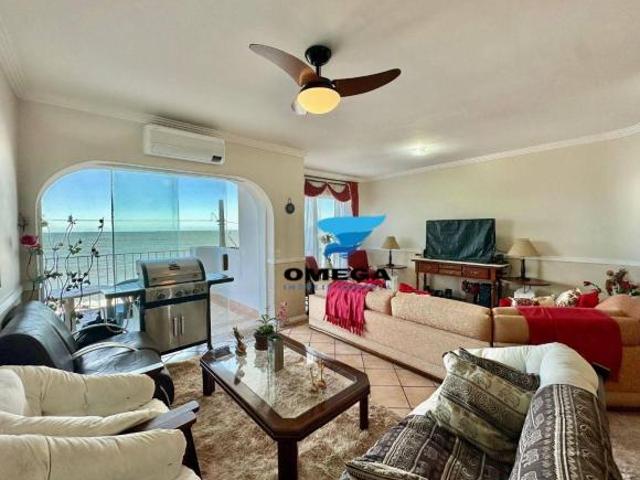 Apartamento beira mar à venda na praia das Pitangueiras no Guarujá I Omega Imoveis