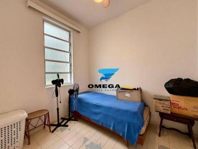 Apartamento beira mar à venda na praia das Pitangueiras no Guarujá I Omega Imoveis