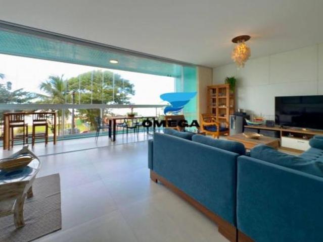 Apartamento beira mar à venda na praia das Pitangueiras no Guarujá I Omega Imoveis