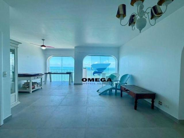 Apartamento beira mar à venda na praia das Pitangueiras no Guarujá I Omega Imoveis