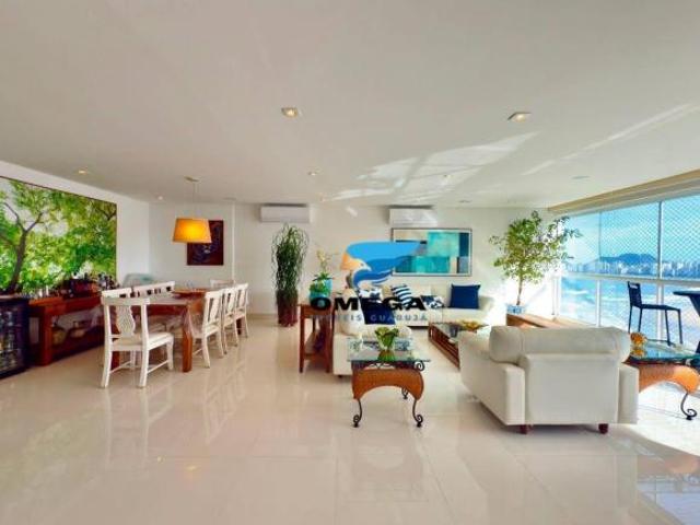 Apartamento beira mar à venda na praia das Pitangueiras no Guarujá I Omega Imoveis