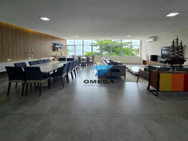Apartamento beira mar à venda na praia das Pitangueiras no Guarujá I Omega Imoveis
