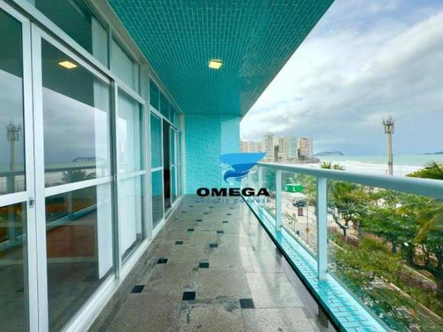 Apartamento beira mar à venda na praia das Pitangueiras no Guarujá I Omega Imoveis