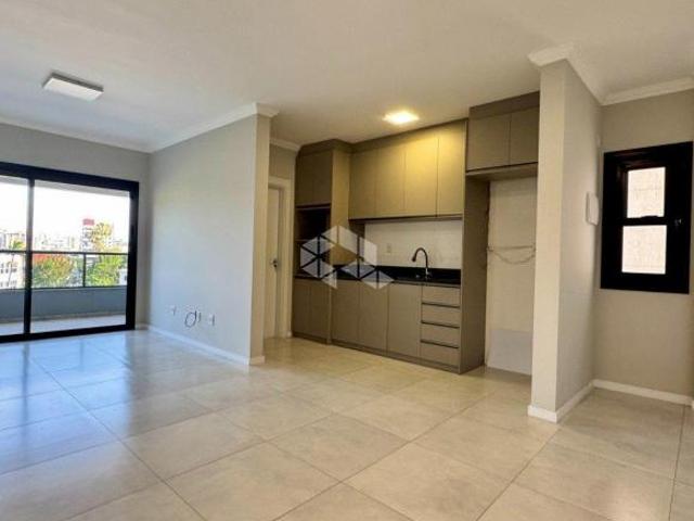 Apartamento central com 02 dormitórios e suíte