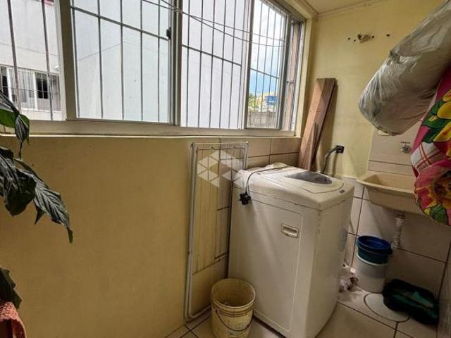 Apartamento central, com 2 dormitórios e 1 vaga