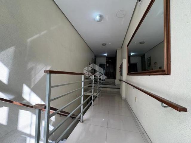 APARTAMENTO CENTRAL DE 2 DORMITÓRIOS COM 1 VAGA