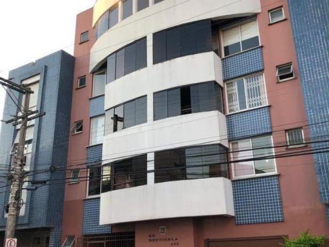 Apartamento central 2 dormitórios com garagem