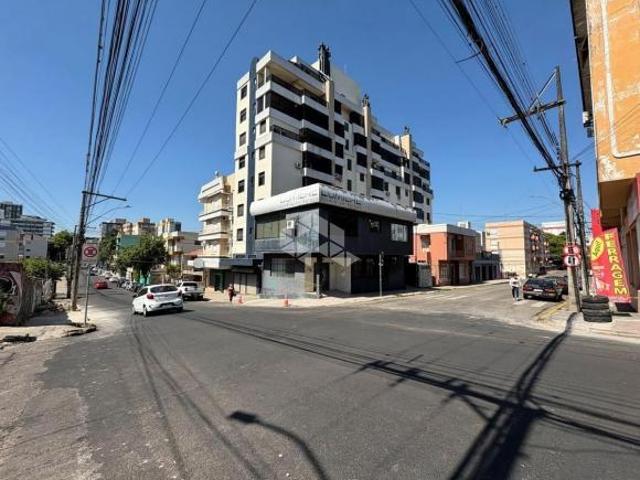 APARTAMENTO CENTRAL 2 DORMITÓRIOS COM 1 VAGA