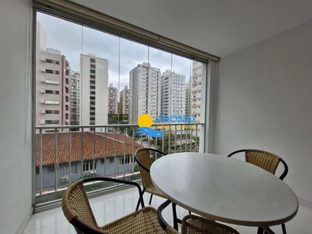 Apartamento beira mar com sacada — Pitangueiras — Guarujá