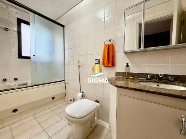 Apartamento com 3 dormitórios à venda, 110 m² por R$ 700.000,00 Pitangueiras Guarujá/SP