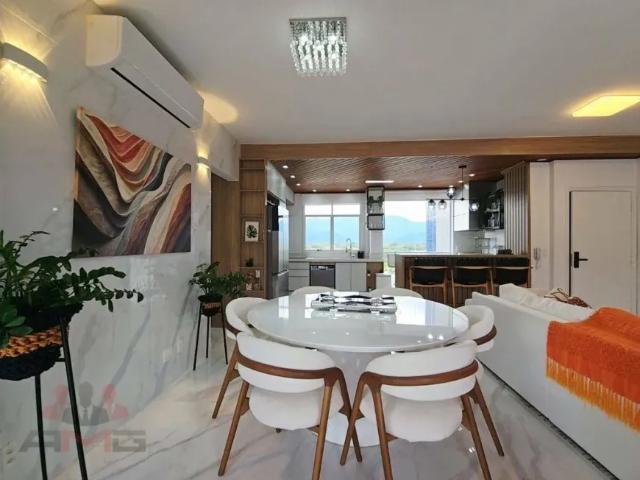 Apartamento com 3 dormitórios à venda, 117 m² por R$ 3.500.000,00 Riviera Módulo 3 Bertioga/SP