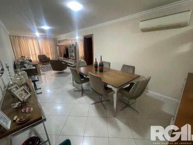 Apartamento com 3 dormitórios, 1 suíte, lavabo, 2 vagas cobertas, semimobiliado