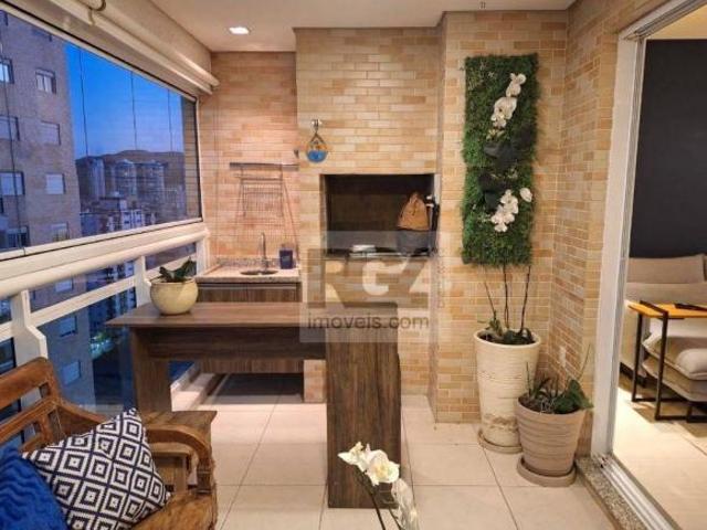 Apartamento com 3 dormitórios à venda, 103 m² por R$ 1.300.000,00 Ponta da Praia Santos/SP