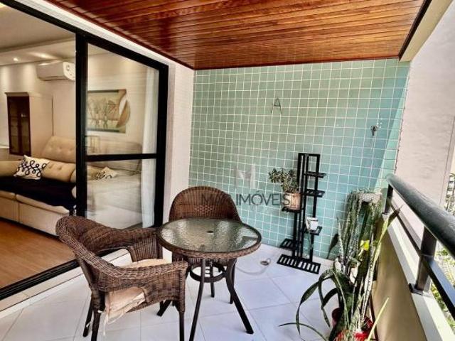 Apartamento com 3 dormitórios à venda, 100 m² por R$ 750.000,00 Pitangueiras Guarujá/SP