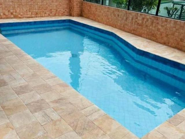 Apartamento com 3 dormitórios à venda, 105 m² por R$ 530.000,00 Vila Guilhermina Praia Grande/SP