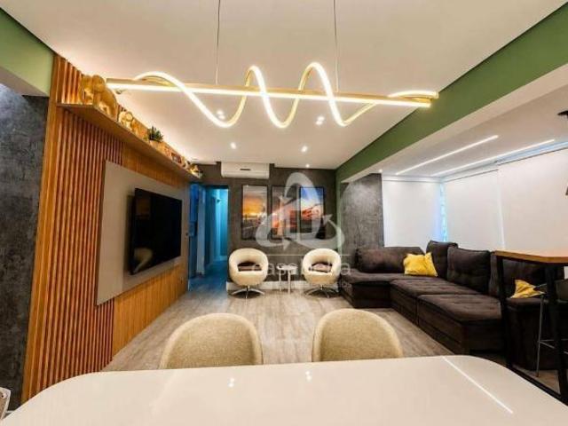 Apartamento com 3 dormitórios à venda, 111 m² por R$ 1.330.000,00 Ponta da Praia Santos/SP