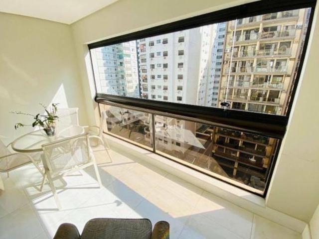 Apartamento com 3 dormitórios à venda, 112 m² por R$ 700.000,00 Pitangueiras Guarujá/SP