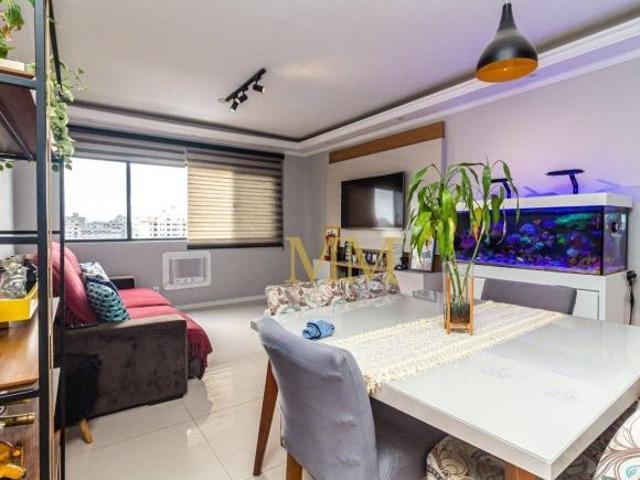 Apartamento com 3 dormitórios à venda, 92 m² por R$ 600.000,00 Ponta da Praia Santos/SP