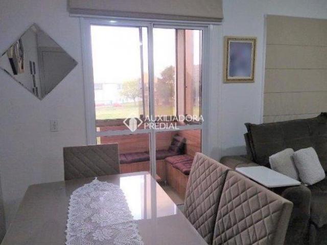 Apartamento com 3 dormitórios e uma suíte, vaga de garagem no bairro Humaitá