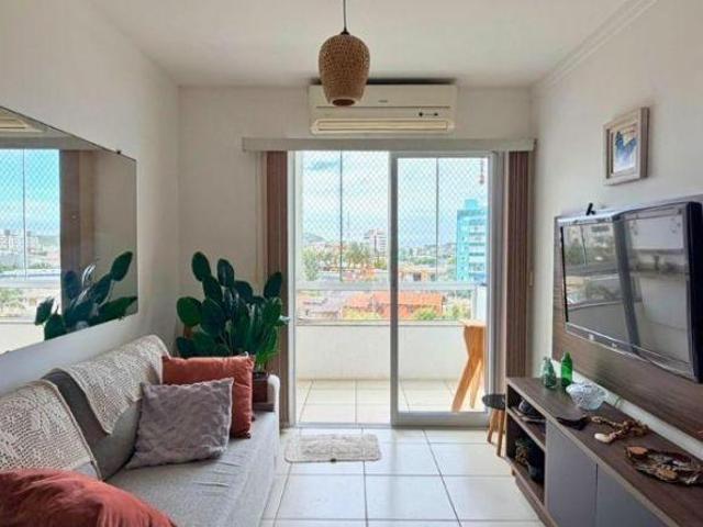 Apartamento com 3 dormitórios e vista para a lagoa á venda em Torres RS