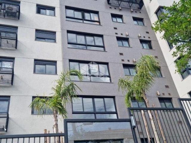 Apartamento com 3 dormitórios, sendo 1 suíte e 2 vagas no bairro Menino Deus