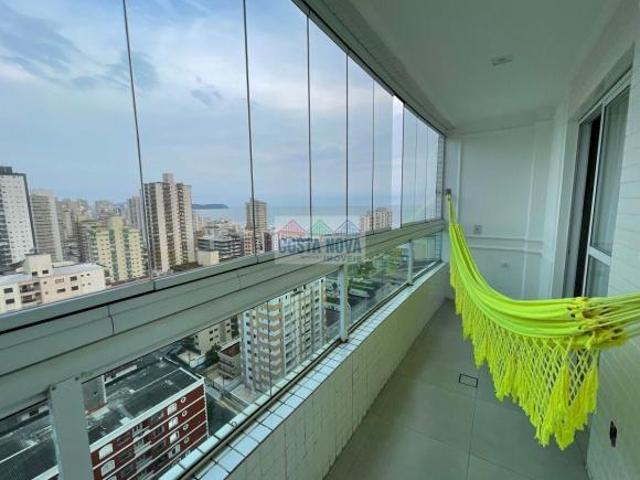 Apartamento com 3 suítes, 4 banheiros, 2 vaga, mobiliado na Vila Tupi. Vista Mar alto padrão