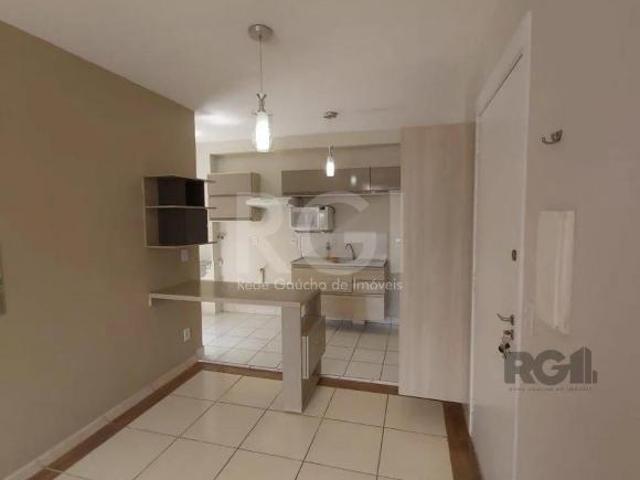Apartamento com 01 dormitório, sala, cozinha, banheiro social, bem arejado, óti