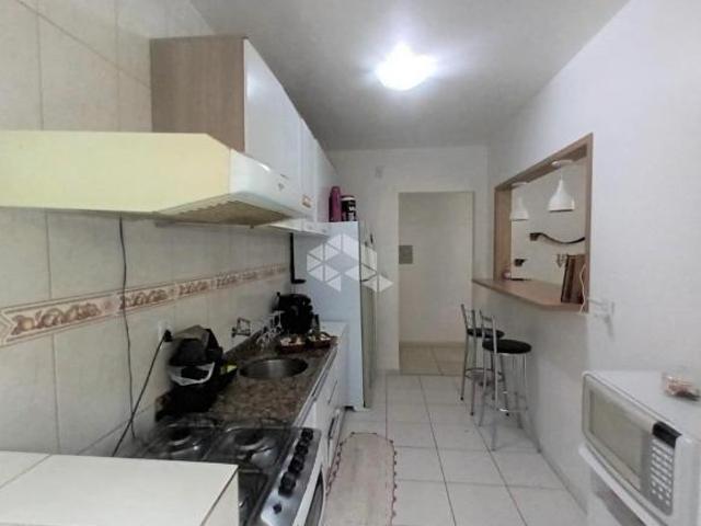 Apartamento com 02 dormitórios com 01 vaga de garagem escriturada