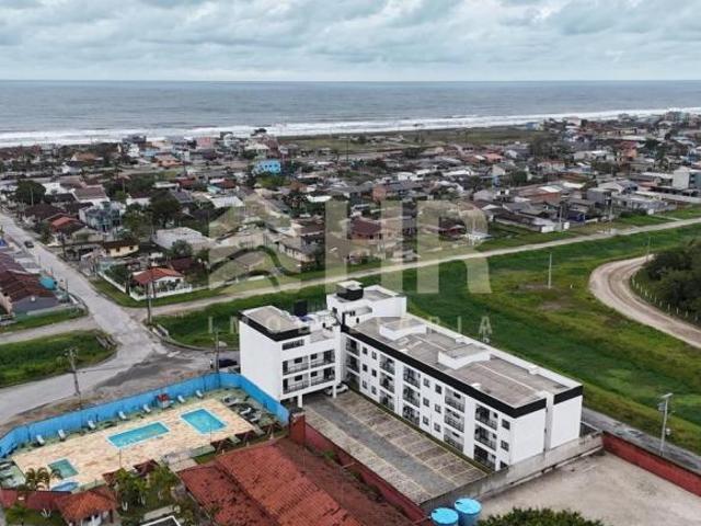 Apartamento com 02 dormitórios e 01 vaga de gara