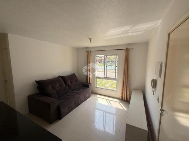 Apartamento com 02 dormitórios localizado no bairro Igara