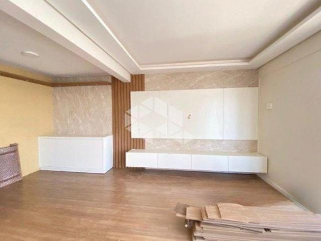 Apartamento com 02 dormitórios, sendo uma suíte, todo reformado no Centro de Santa Cruz do Sul!