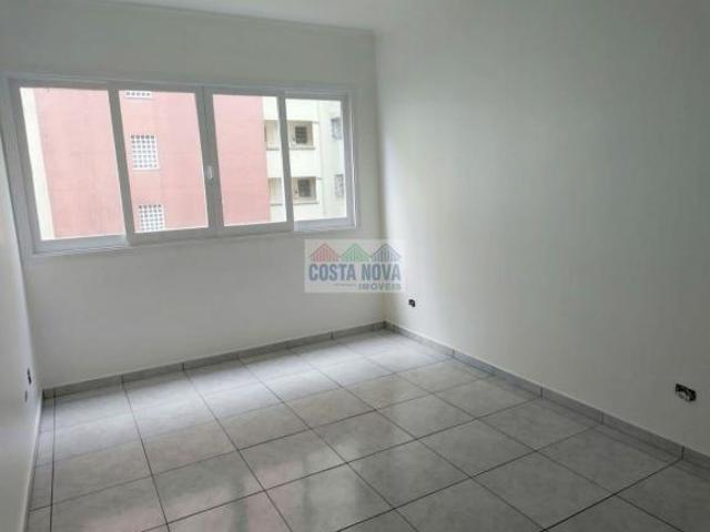Apartamento com 100m², 2 quartos, 2 banheiros, 1 vaga. No Gonzaguinha a uma quadra da praia