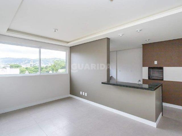 Apartamento com 1 dormitório no bairro Partenon COD: 18584