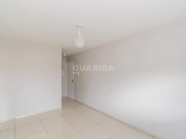 Apartamento com 1 dormitório e 1 vaga de garagem no bairro Jardim Botânico COD: 10943