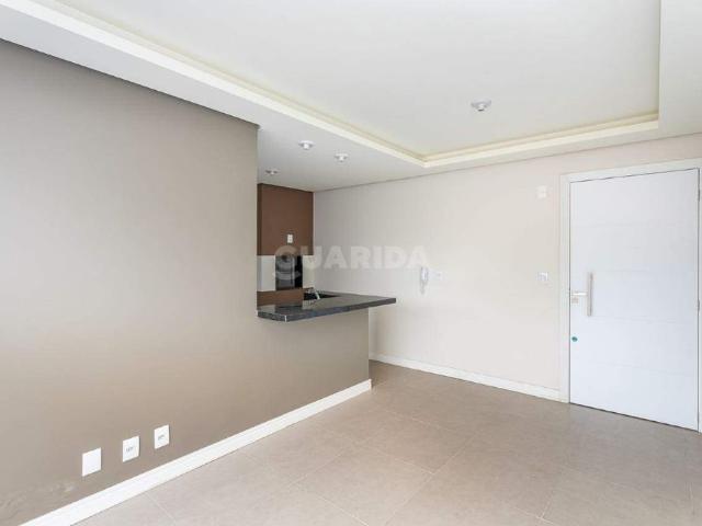 Apartamento com 1 dormitório e 1 vaga de garagem no bairro Partenon COD: 18358