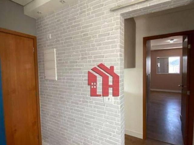 Apartamento com 1 suíte, sala com sacada e fechamento de vidro, lavabo, cozinha americana. 1 vaga, L