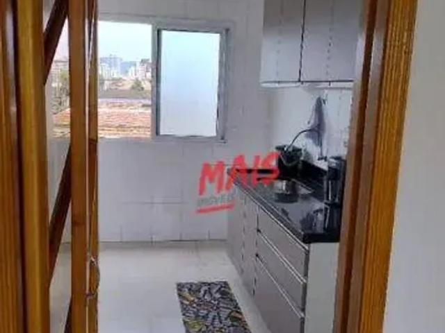 Apartamento com 2 dormitórios à venda, 63 m² por R$ 410.000,00 Macuco Santos/SP