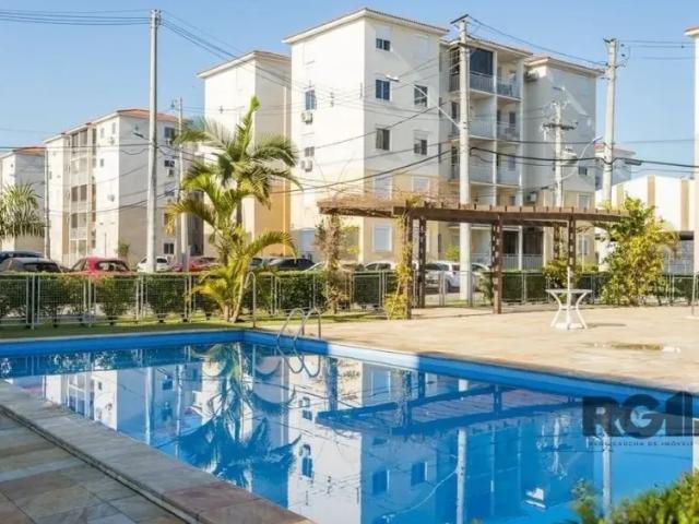 Apartamento com 2 dormitórios e 1 vaga de garagem escriturada no Bairro Humaitá