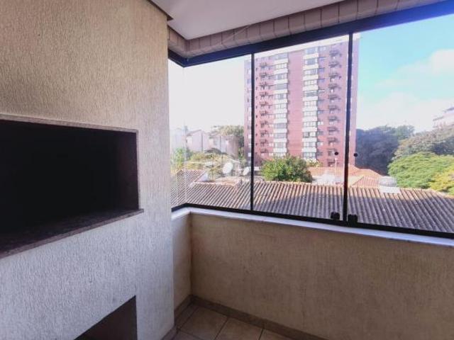 Apartamento com 2 dormitórios, 1 suite, sacada, churrasqueira e vaga coberta. Sã