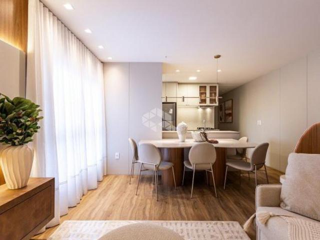 Apartamento com 2 dormitórios 1 suíte 1 demi suíte mobiliado com box/vaga de garagem no Centro de Ca