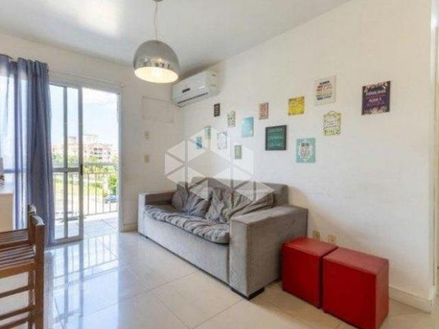 Apartamento com 2 dormitórios, 1 suíte, 2 vagas no bairro Jardim Carvalho em Po